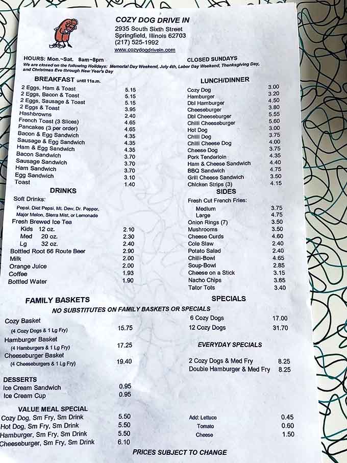 The menu board showcases American classics at their finest – from breakfast favorites to the legendary Cozy Dogs that put this place on the map.