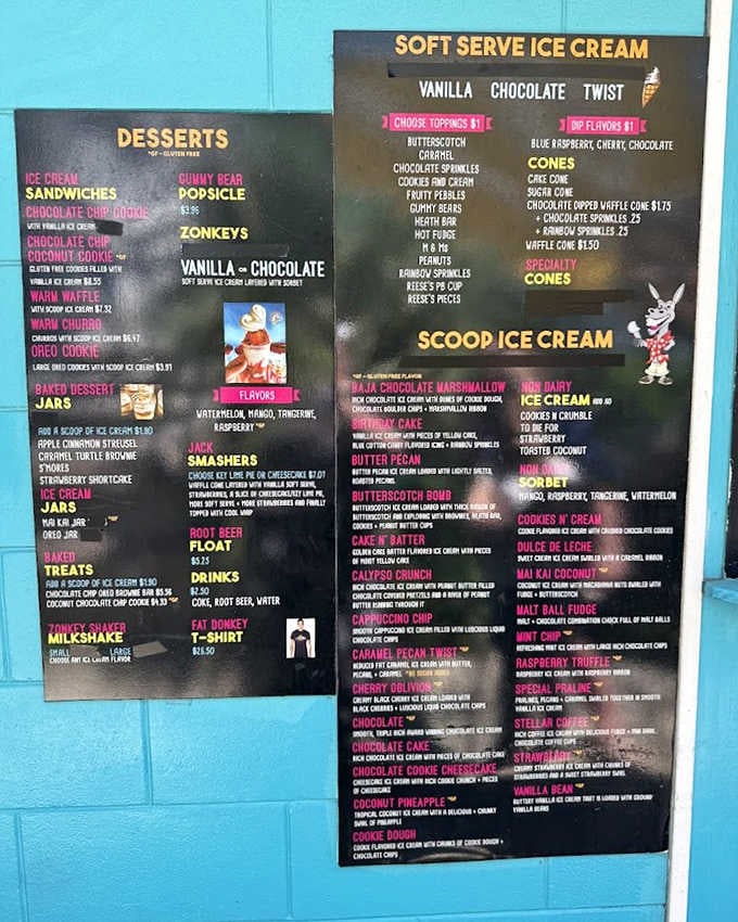 Decision paralysis has never been sweeter! The menu board showcases a dizzying array of homemade flavors that make "chocolate or vanilla" seem like a tragic limitation.