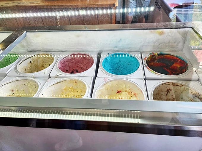 The ice cream flavor selection stretches across the freezer case like a rainbow made of dairy, each one more tempting than the last.