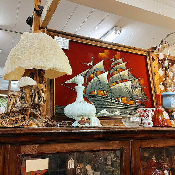 That vintage ship painting? Probably sailed through someone's living room for decades before docking alongside mid-century treasures.