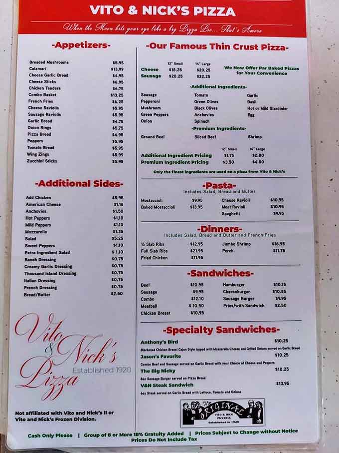 The menu tells a story of Italian-American classics perfected over generations, with that famous thin-crust pizza taking center stage.