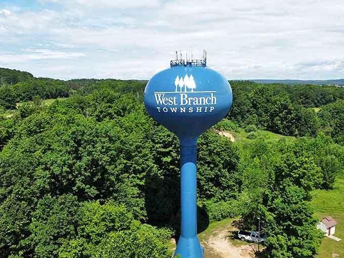 The iconic blue water tower stands tall against Michigan's sky, a beacon welcoming visitors home to West Branch Township.