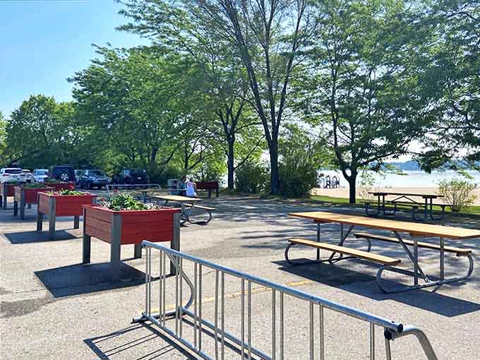 These aren't just picnic tables &ndash; they're front-row seats to nature's greatest show, with Lake Michigan providing the backdrop.