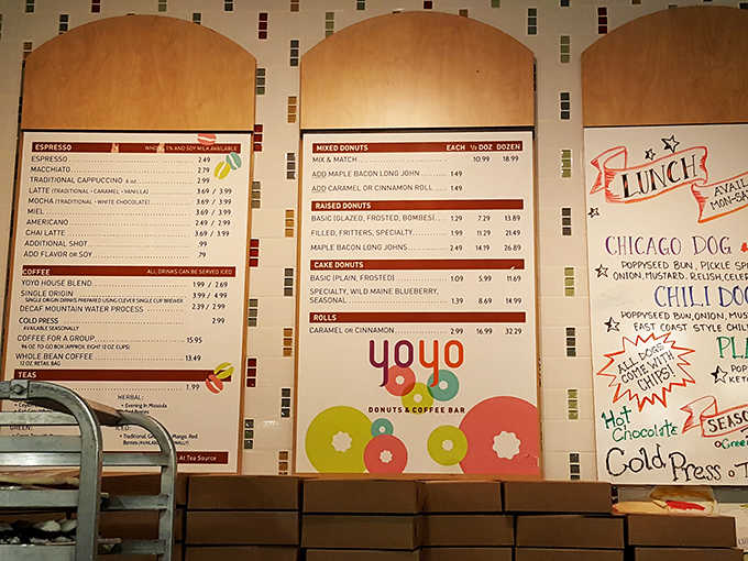 Decision paralysis has never been so delicious &ndash; YoYo's menu board showcases their impressive array of donuts and coffee options.