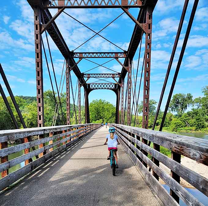 The converted railroad bridge offers cyclists a dramatic passage over the Root River, connecting trails that wind through some of Minnesota's most stunning landscapes.