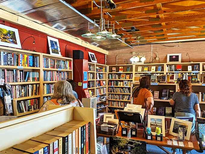 Browsers lose themselves among meticulously organized shelves where each book stands ready for discovery, like a literary treasure hunt for grown-ups.
