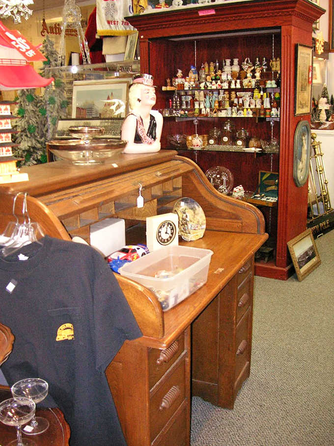 Wooden cabinets with stories etched into their grain stand sentinel, housing smaller treasures behind glass doors that reflect decades past.