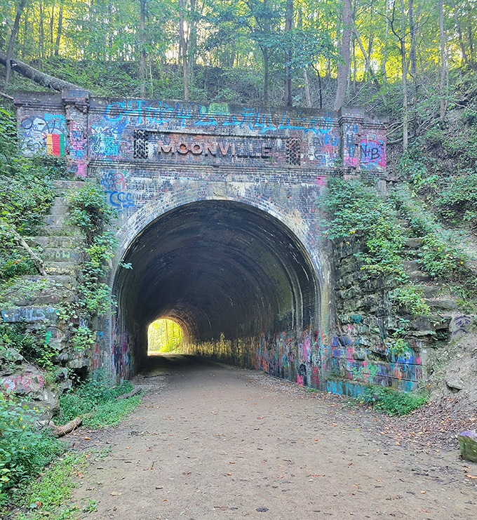 Colorful graffiti adorns the "Moonville" entrance, adding contemporary art to this historic railway relic.