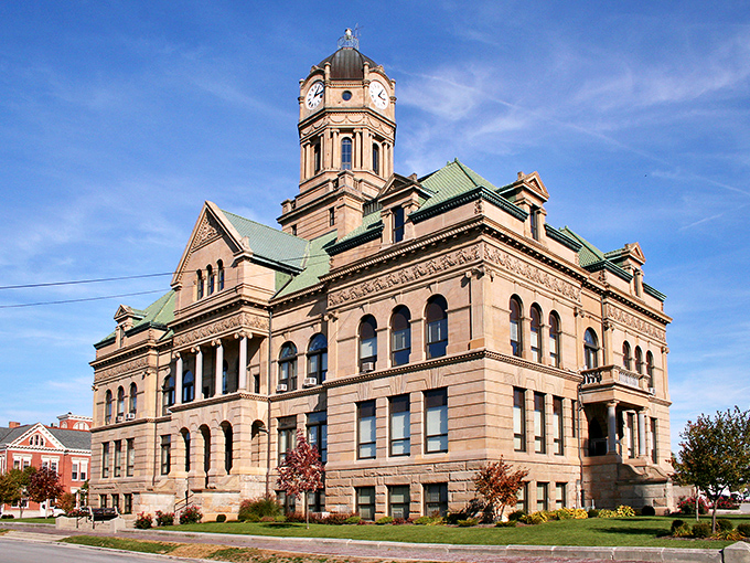 The Auglaize County Courthouse commands attention with its Romanesque Revival architecture and stately clock tower watching over the town.