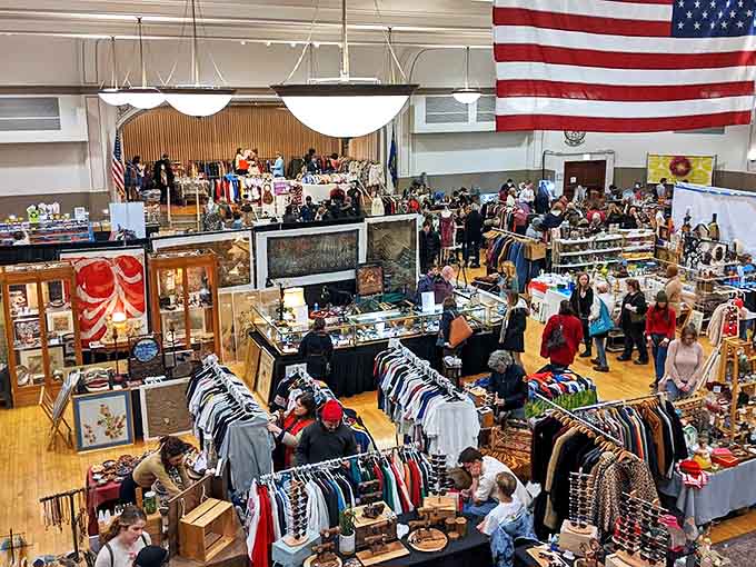 Shoppers navigate the bustling aisles, each on their own treasure hunt among the market's eclectic offerings.
