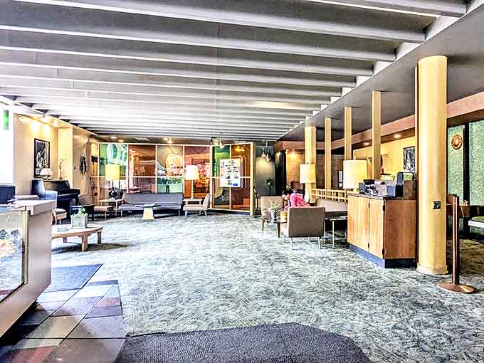 The spacious lobby isn't just a place to pass through&mdash;it's a destination itself, where vintage furniture invites you to linger.