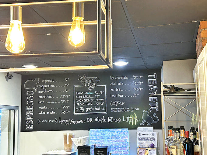 The chalkboard menu tempts with specialty drinks like honey cinnamon lattes and maple turmeric concoctions &ndash; each crafted with barista precision.