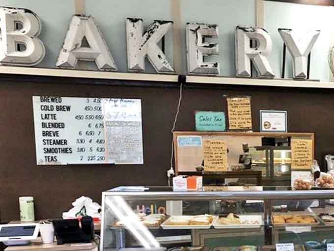 The menu board showcases a tempting array of caffeinated companions for your pastry adventure &ndash; liquid courage for maximum donut consumption.