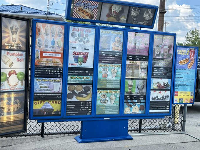 The expansive menu board showcases a dizzying array of frozen delights, from classic soft serve to elaborate parfaits and Wizzards.