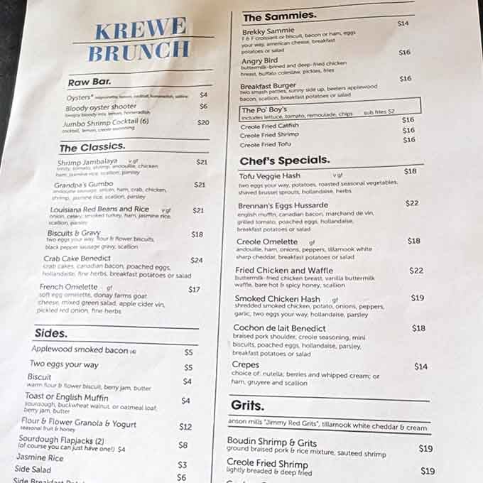 The drink menu reads like a love letter to New Orleans cocktail culture, with classics like Sazeracs sharing space with Minnesota craft brews.