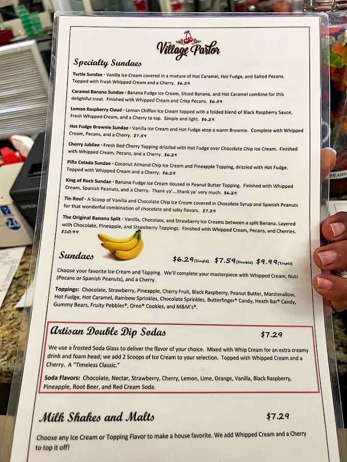 The menu reads like a love letter to dessert enthusiasts – specialty sundaes with names like "Lemon Raspberry Cloud" tempt even the most disciplined diners.