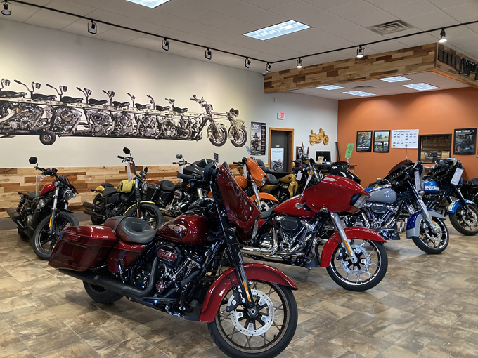 Gleaming Harley-Davidson motorcycles line up like chrome soldiers, ready for their next adventure on Wisconsin's open roads.