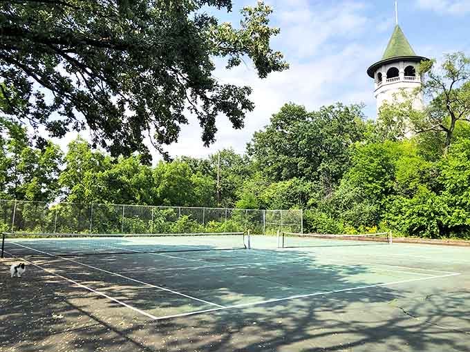 Tennis, anyone? The courts near the tower offer recreation with a side of architectural splendor.