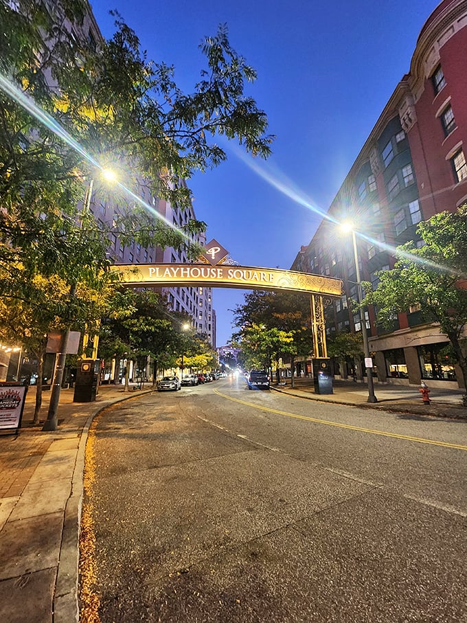 The Playhouse Square archway welcomes visitors day and night, a golden gateway to Cleveland's dazzling theater district.