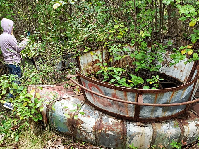 What once carried laughing passengers now rests as abstract sculpture&mdash;this rusting boat ride becoming one with the landscape around it.