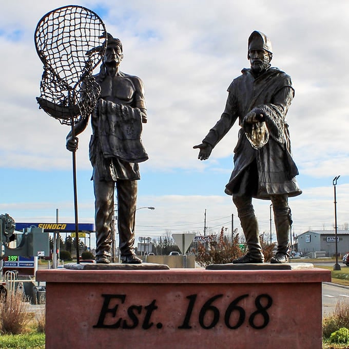 This statue commemorates the 1668 meeting between French explorers and Native Americans, marking the moment Sault Ste. Marie officially entered the history books.
