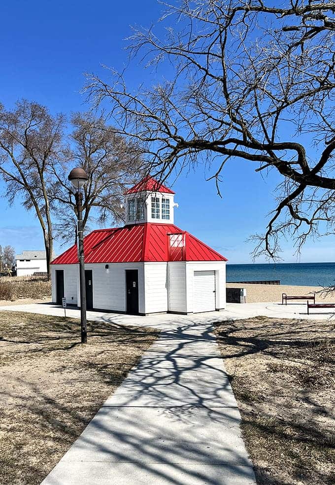 The Harbor Pavilion sits ready to provide shelter and facilities, proving that beach comfort doesn't have to mean roughing it like you're auditioning for a survival show.