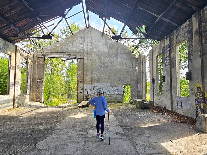 Nature's skylight: The missing roof allows trees to grow within these historic walls, turning industrial ruins into an accidental greenhouse.