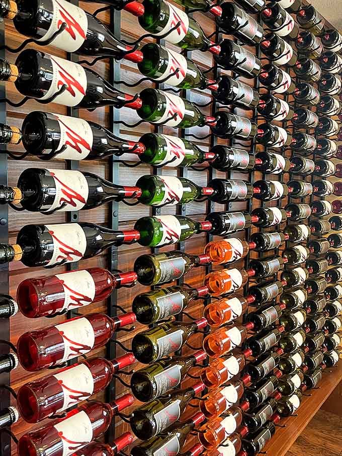 The wall display showcases M Cellars' award-winning bottles, each one a testament to Ohio's surprising viticultural prowess.