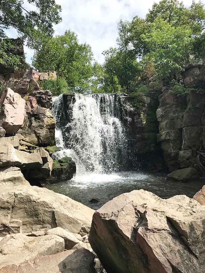 Winnewissa Falls flows over red quartzite rocks that have witnessed centuries of history and countless visitors seeking peace and inspiration.