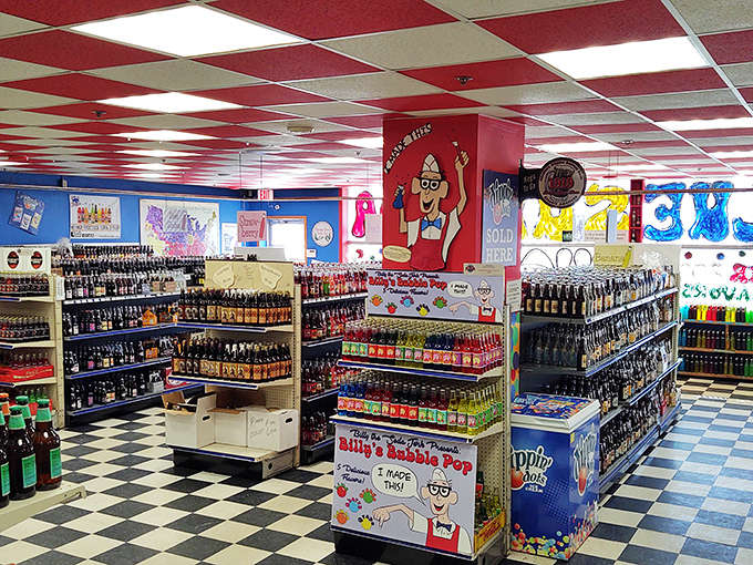 Grandpa Joe's interior is a nostalgic wonderland with its classic red and white checkered ceiling and rows of colorful bottles that would make Willy Wonka proud.
