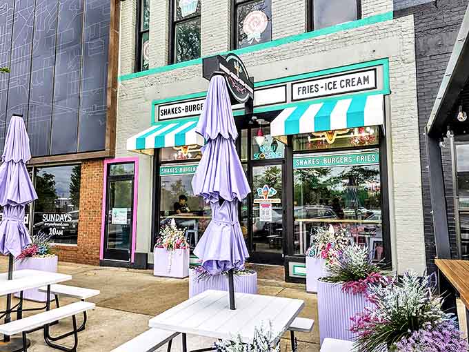 RJ's Metropolitan Ice Cream Co. brings fresh energy to downtown Jackson with its stylish teal and white storefront. The outdoor seating area creates a perfect urban oasis for ice cream enjoyment.