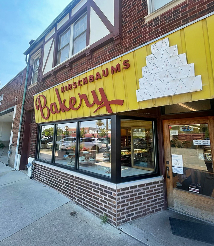 Kirschbaum's Bakery's distinctive yellow awning has been a Western Springs landmark for generations. The classic storefront promises timeless treats inside.