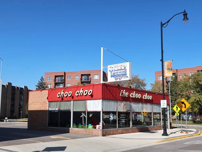Sunlight streams through The Choo Choo's windows, highlighting its unique train-delivery concept that's been delighting diners for generations.