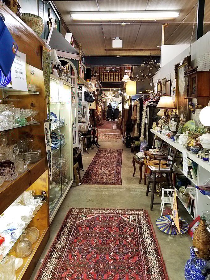 Oriental rugs guide visitors through narrow passages of curated curiosities, like breadcrumbs leading to your next great find.