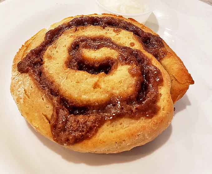This isn't just any cinnamon roll &ndash; it's a spiral of breakfast perfection that makes Monday mornings bearable and weekend brunches unforgettable.