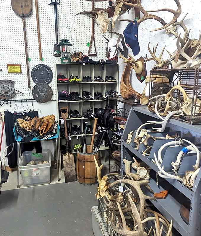 The antler collection would make any hunting lodge jealous &ndash; nature's sculptures displayed alongside vintage outdoor gear for the rustic enthusiast.