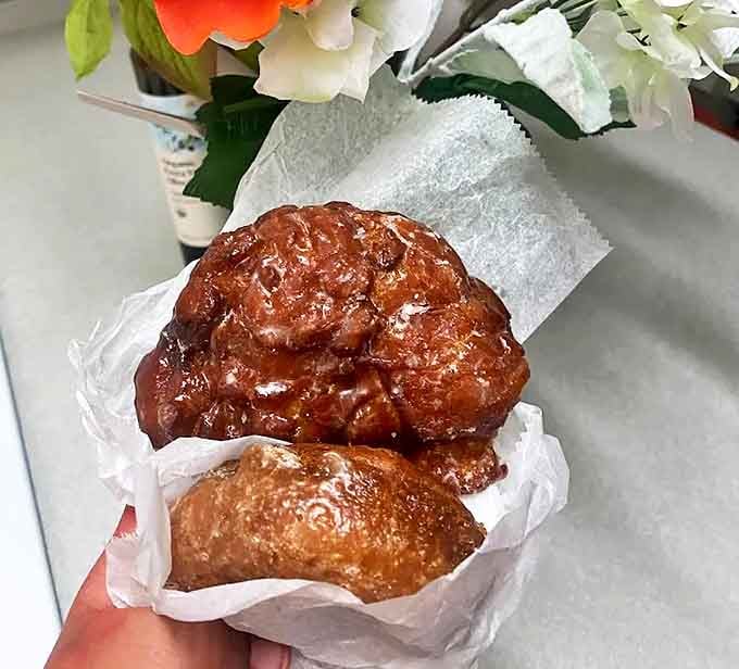 These apple fritters aren't just donuts – they're architectural marvels with neighborhoods of apple chunks connected by boulevards of cinnamon-spiced dough.