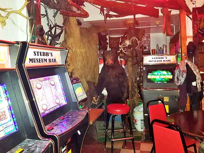 Vintage arcade games tucked between taxidermy create the kind of surreal juxtaposition that somehow makes perfect sense at Stubb's.