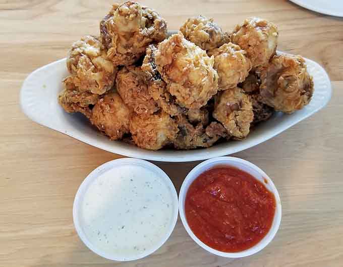 Golden, crispy, and absolutely addictive, these fried mushrooms are the reason people drive from neighboring counties.