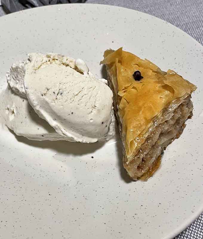Golden baklava meets creamy vanilla ice cream in a pairing that would make Zeus himself weep with joy.