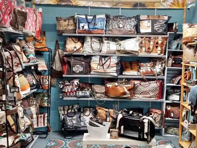 Vintage handbags and totes line the shelves like a fashionista time capsule. Each one probably contains the ghost of a 1950s lipstick and forgotten theater ticket.