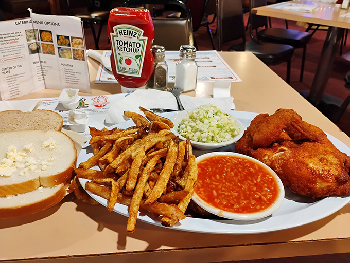 Golden-fried perfection on a plate! The Barberton-style chicken comes with those signature sides that'll have you plotting your next visit.