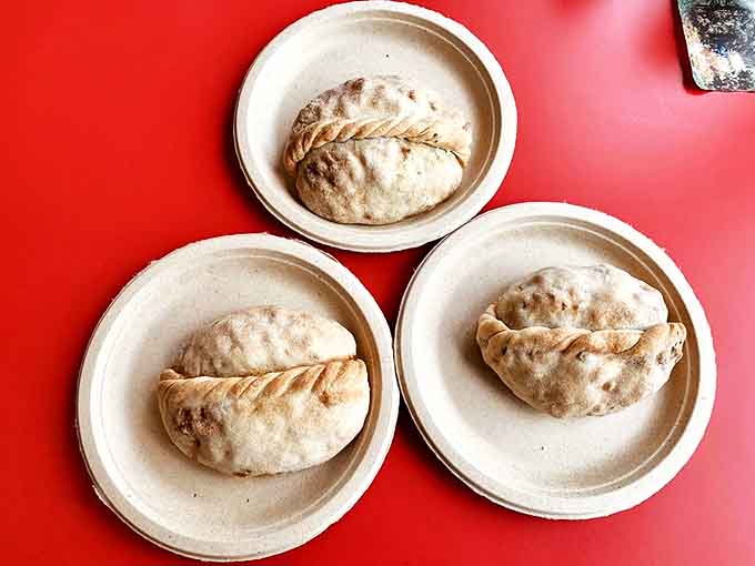 Golden-brown perfection! These pasties aren't just food; they're edible architecture with crusts engineered to hold substantial fillings without sacrificing flakiness.