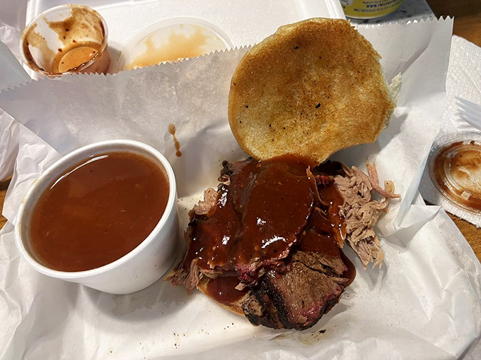 Brisket that would make a Texan weep tears of joy, complete with that coveted pink smoke ring that whispers, "I've been smoked with patience."