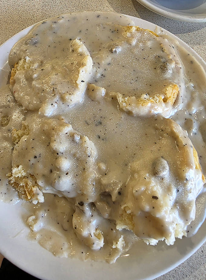 Biscuits and gravy that could make angels weep &ndash; golden pillows drowning in peppery, sausage-studded gravy that's worth crossing state lines for.
