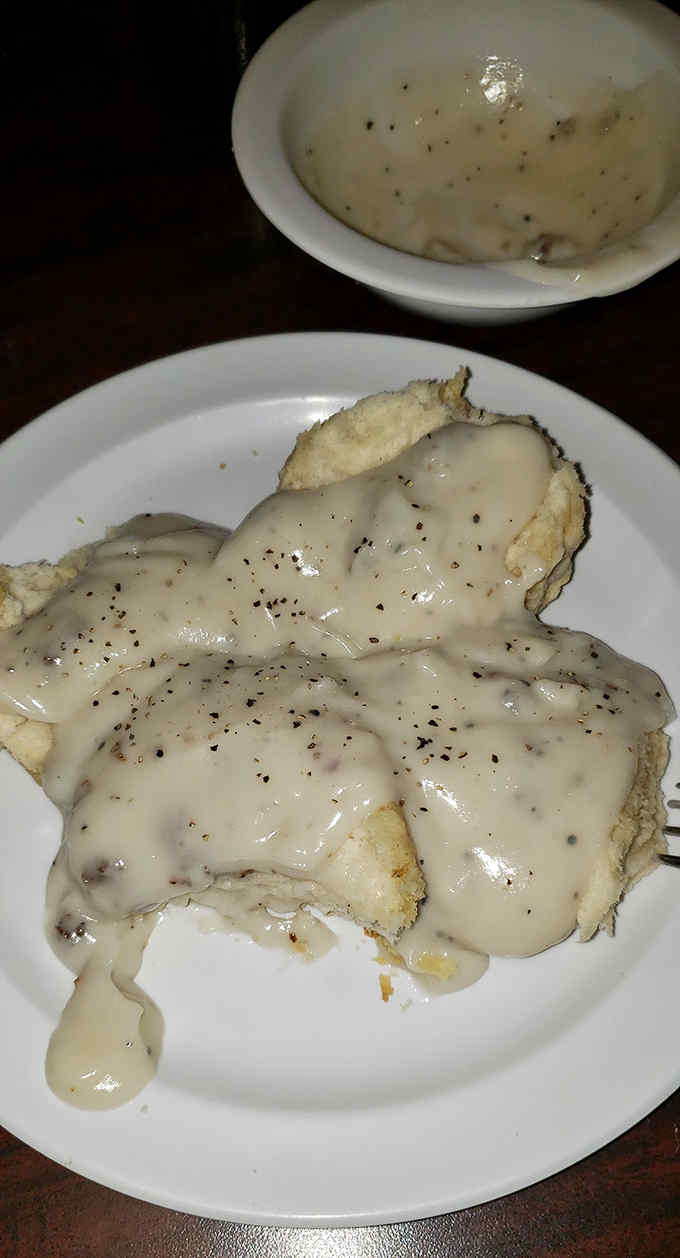 These aren't just biscuits and gravy &ndash; they're a religious experience. Fluffy, buttery biscuits drowning in creamy, peppery heaven.