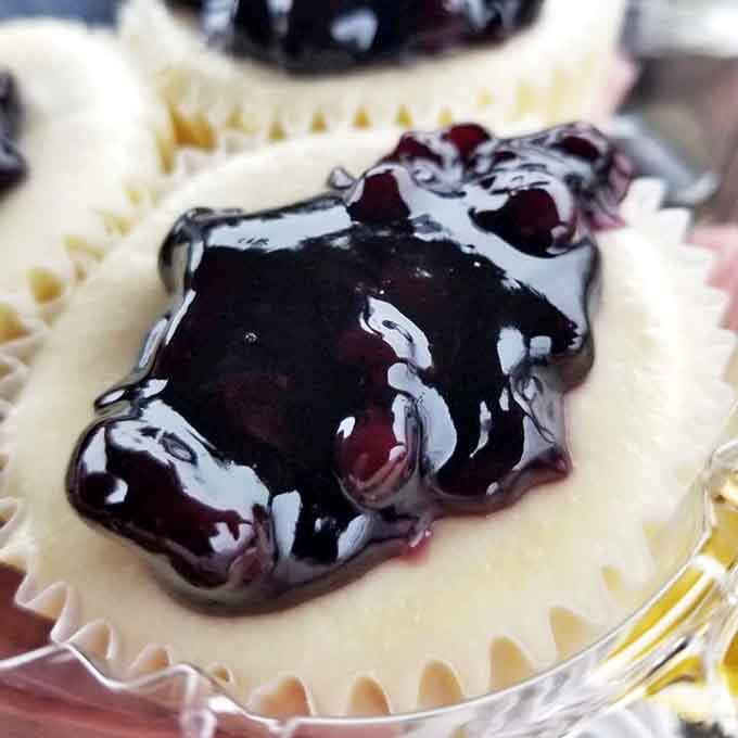 This blueberry cheesecake isn't just dessert&mdash;it's a purple-hued masterpiece where each berry adds a burst of tartness against creamy perfection.