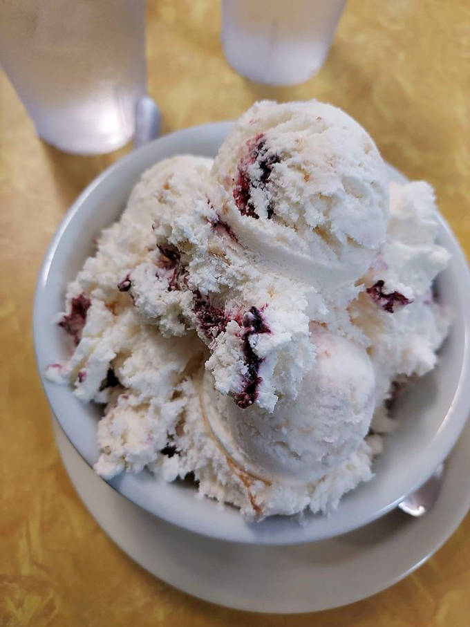 Blueberry crumble ice cream that makes you wonder if grandma's secret recipe somehow found its way into this perfect scoop.