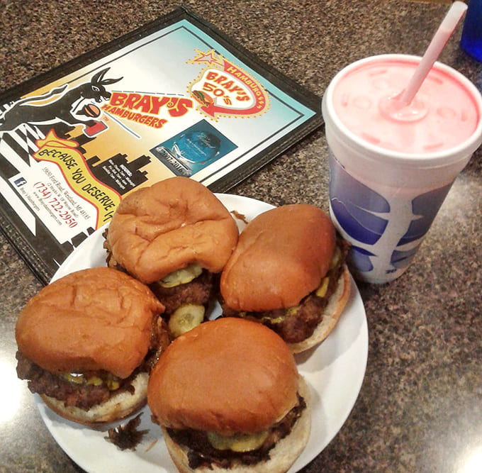 Slider heaven! Four perfectly proportioned burgers surround a strawberry shake so thick you'll need Olympic-level straw skills to enjoy it.