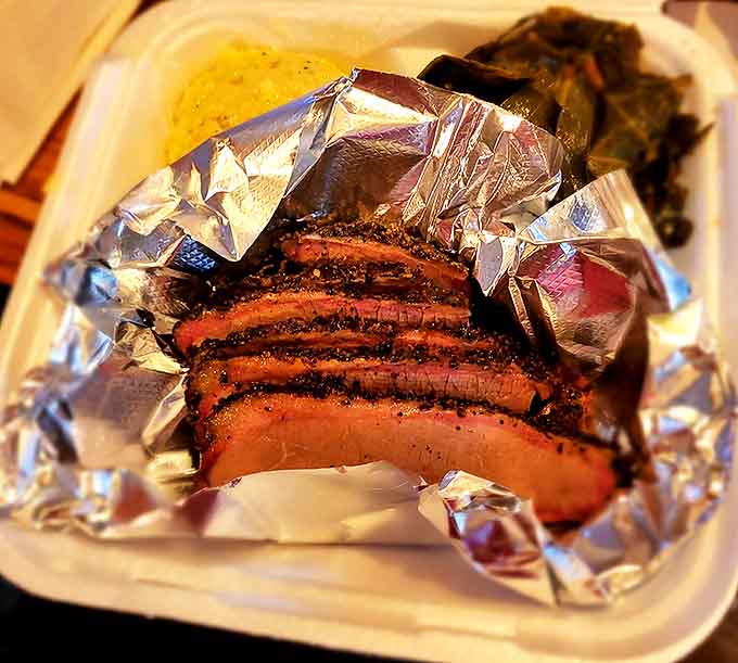 Brisket so tender it practically surrenders at the sight of your fork. That smoke ring isn't just for show &ndash; it's a flavor halo.